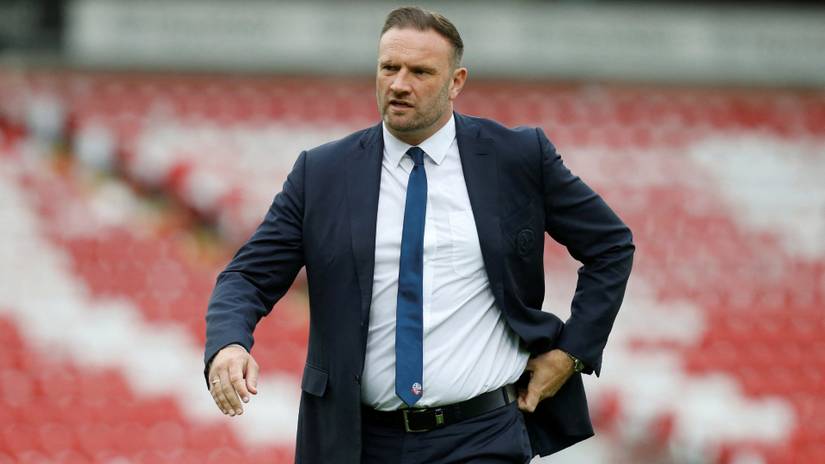 How wealthy is Bolton Wanderers' owner?