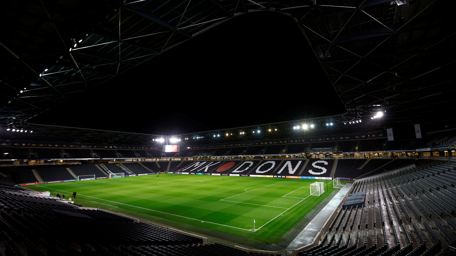 Carlisle United plot MK Dons raid for Mike Williamson